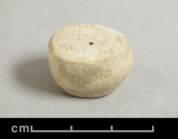 Collection object "MAS.574" • Round disk made of bone. It is ...