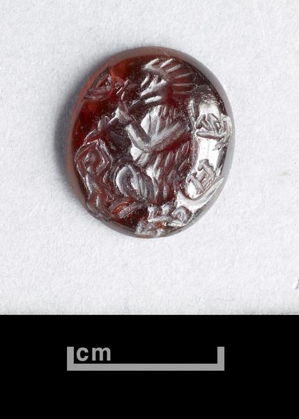 Collection object "MAS.215" • Oval seal made of intaglio garnet. Shown ...